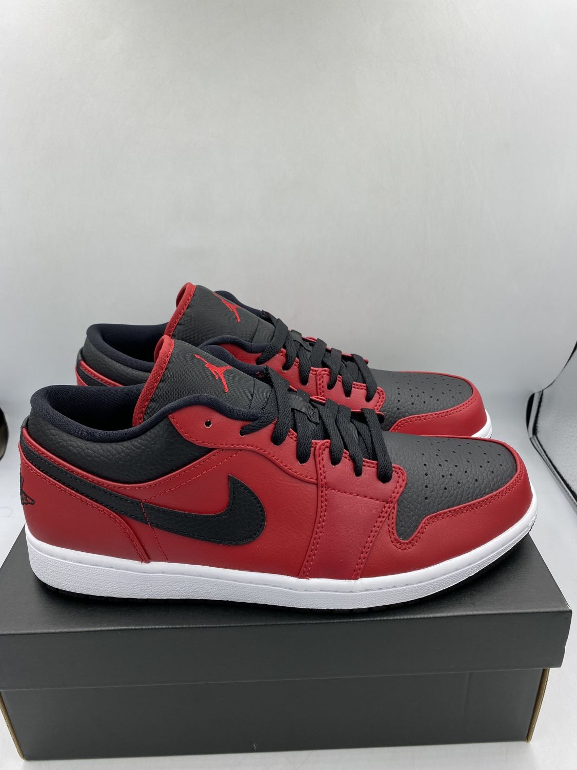 Jordan 1 Low Reverse Bred Pebbeled Swoosh | AfterMarket